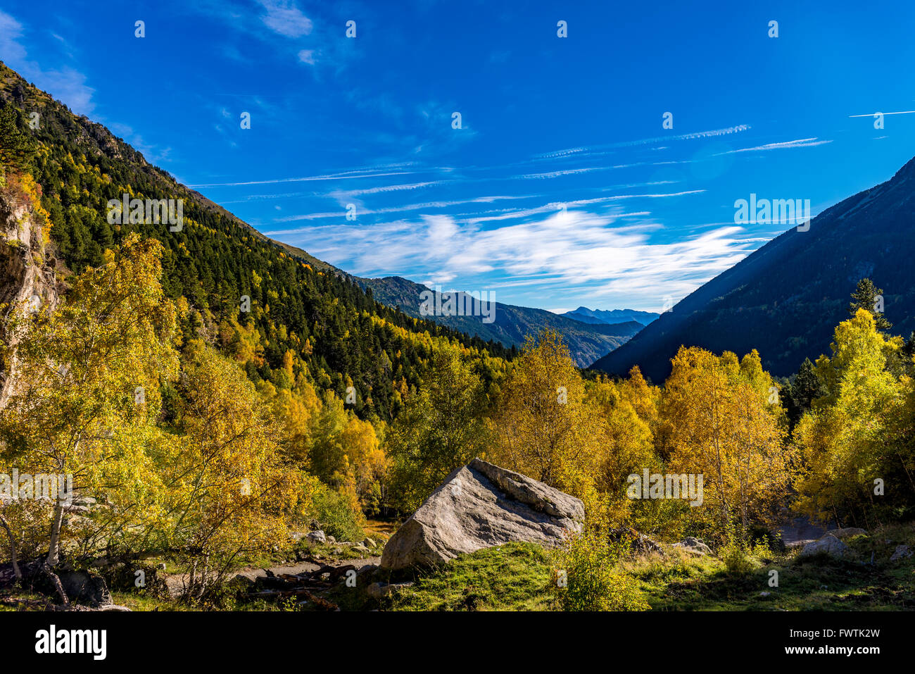 A blue sky over a colorful valley Stock Photo - Alamy