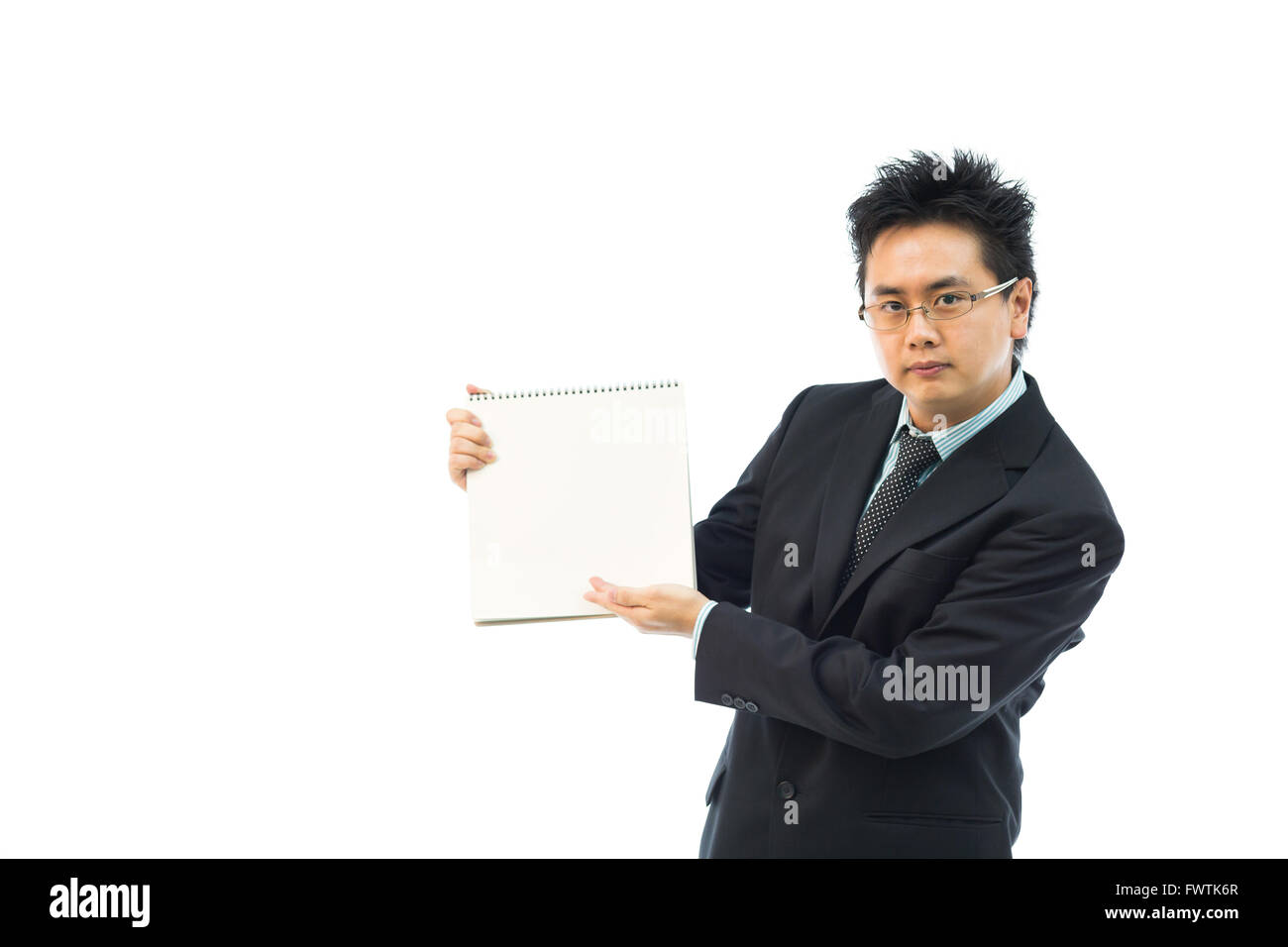Businessman holding blank book for editing isolated over white ...
