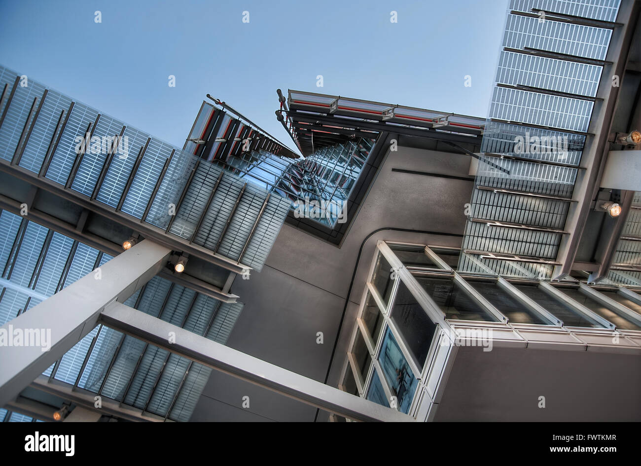 Looking up from the entrance of the Shard. The glass panels overhang ...