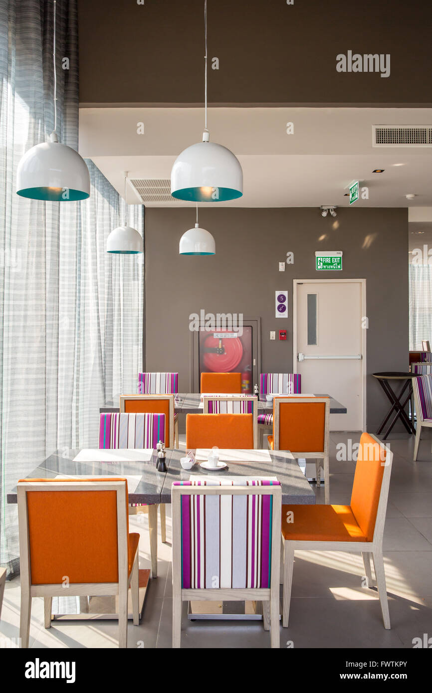 Dining table in hotel restaurant Stock Photo - Alamy