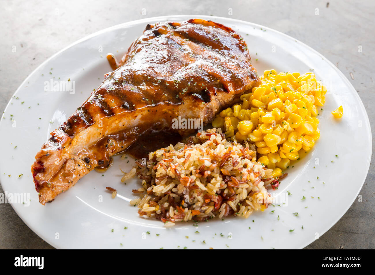 Gourmet Main Entree Course grilled pork chop Stock Photo - Alamy