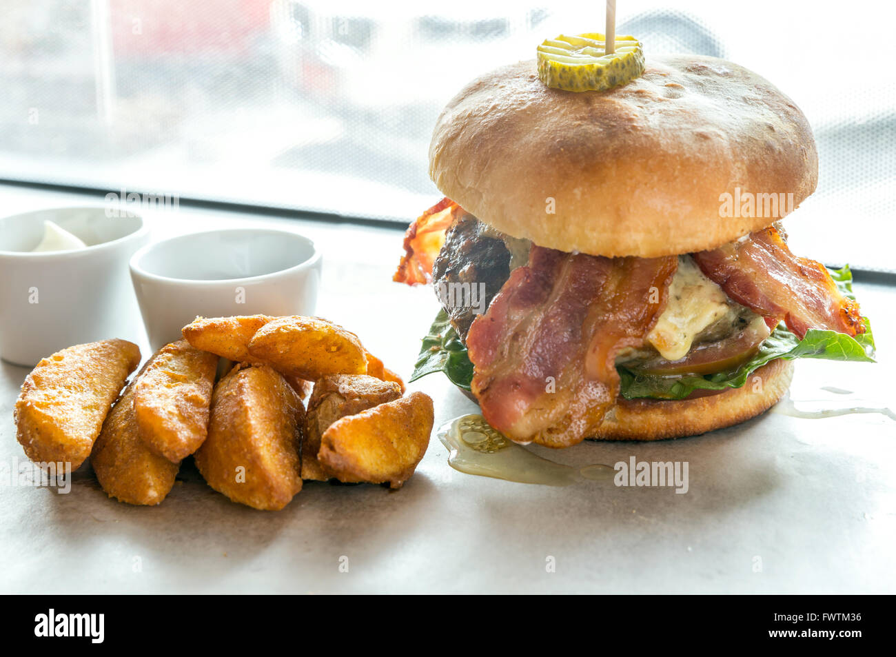Angus beef Cheese hamburger with french fries Stock Photo - Alamy