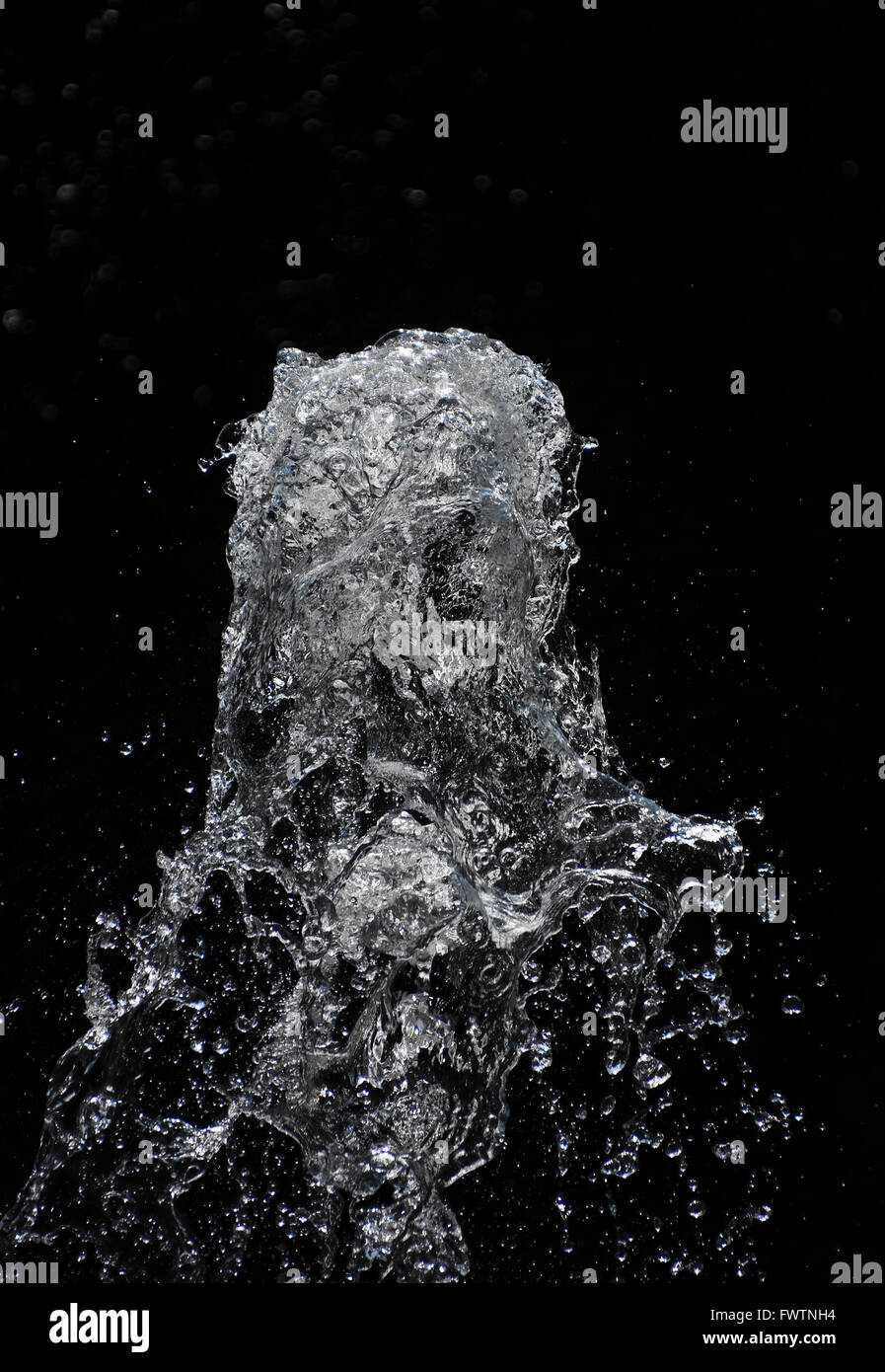 Fountain transparent water stream, splash and drops in motion over ...