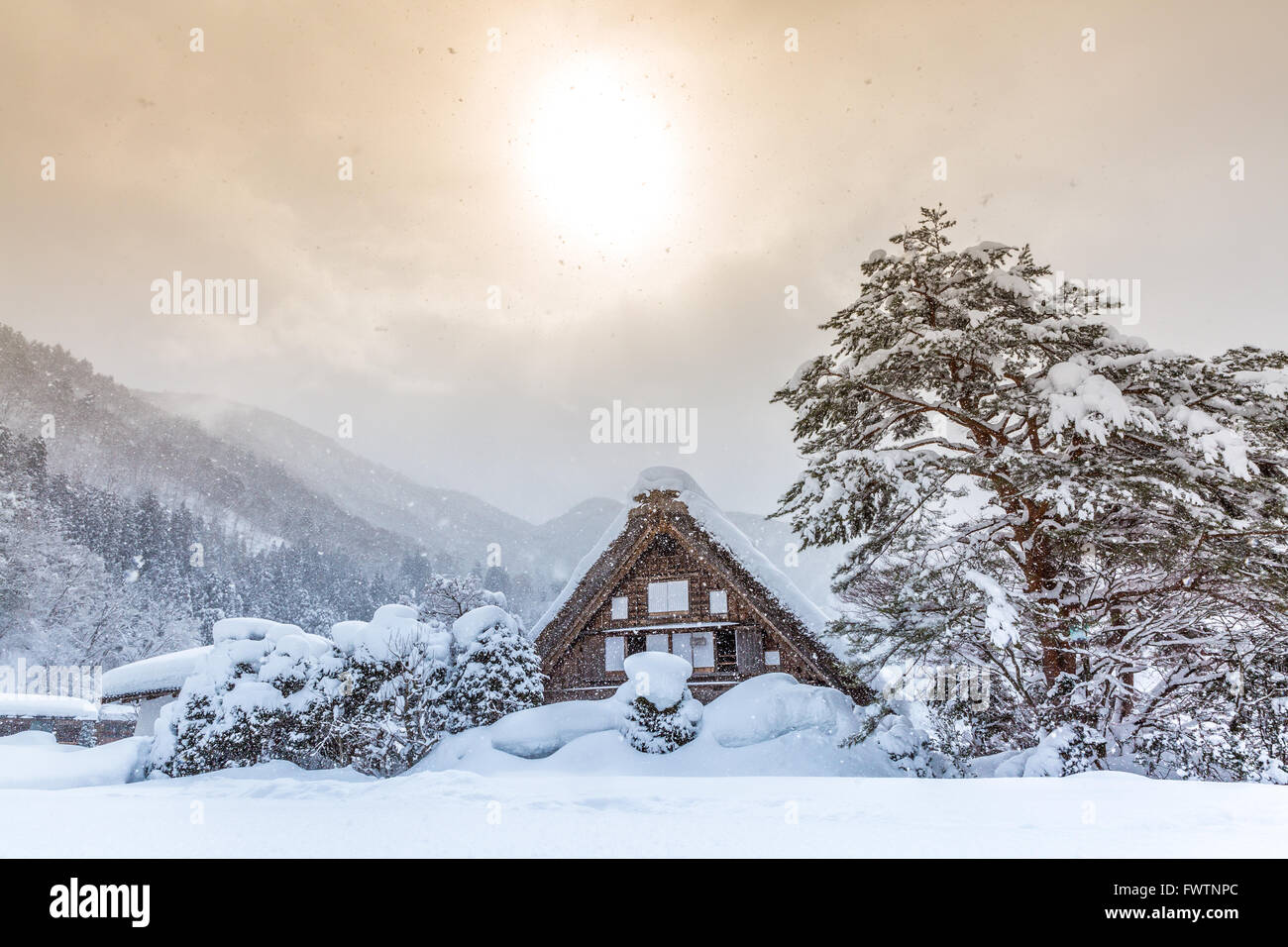 Shirakawago with Snowfall and winter Sun, Gifu Chubu Japan Stock Photo ...