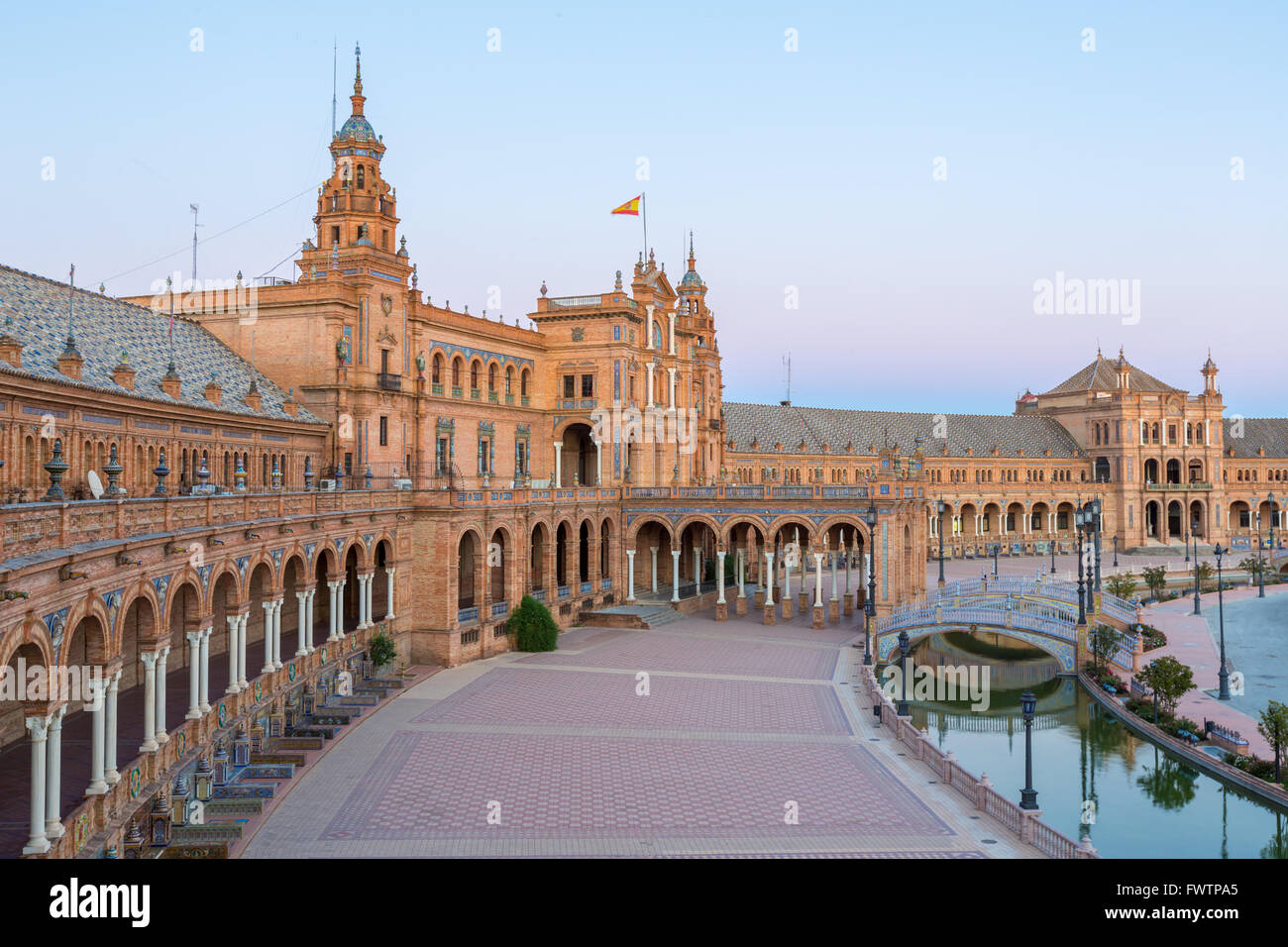 Spanish Square espana Plaza in Sevilla Spain at dusk Stock Photo - Alamy