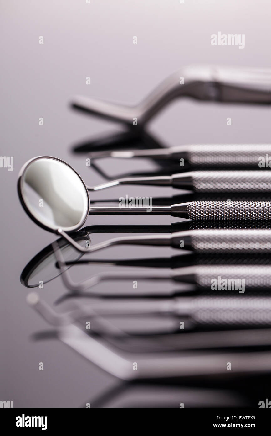 Professional dental tools in a sterile medical light Stock Photo - Alamy