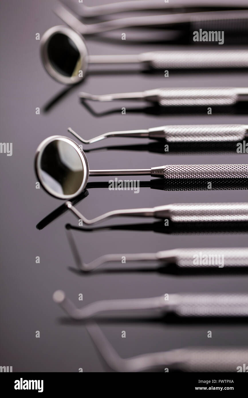 Professional dental tools in a sterile medical light Stock Photo - Alamy
