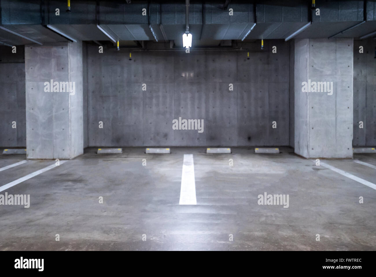 empty Parking garage underground, interior shopping mall at night Stock ...