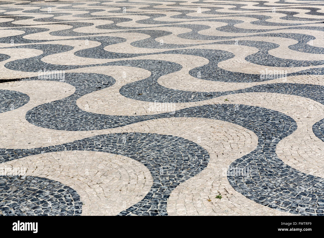 Tile brick floor in Lisbon Town Square, Portugal using as background ...