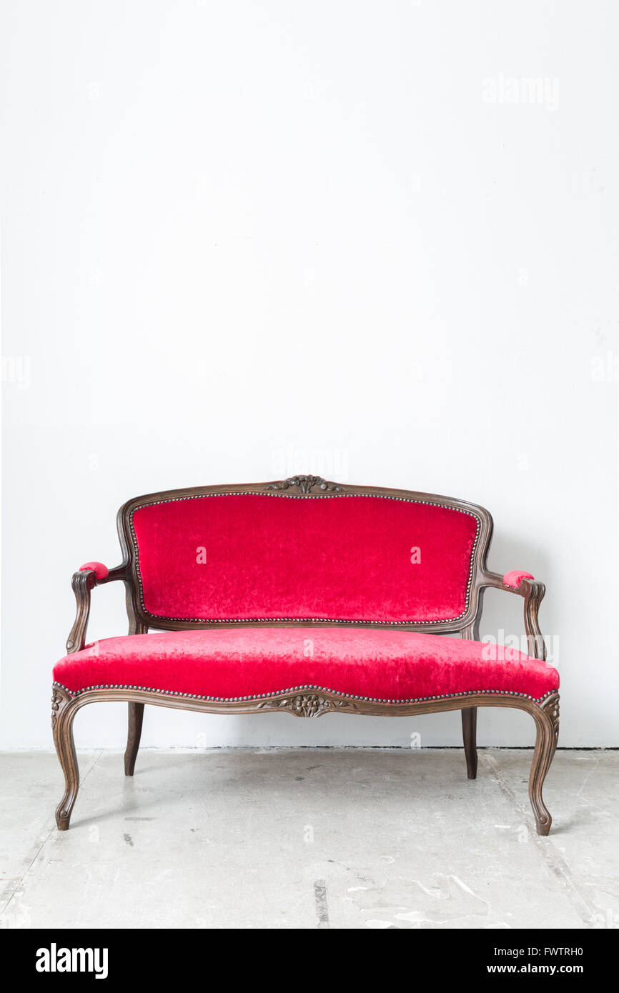 Red sofa Contemporary style in vintage room Stock Photo - Alamy