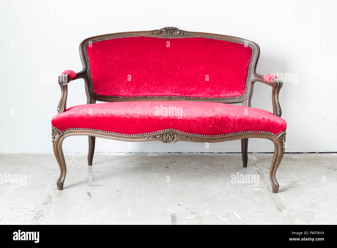 Red sofa Contemporary style in vintage room Stock Photo - Alamy