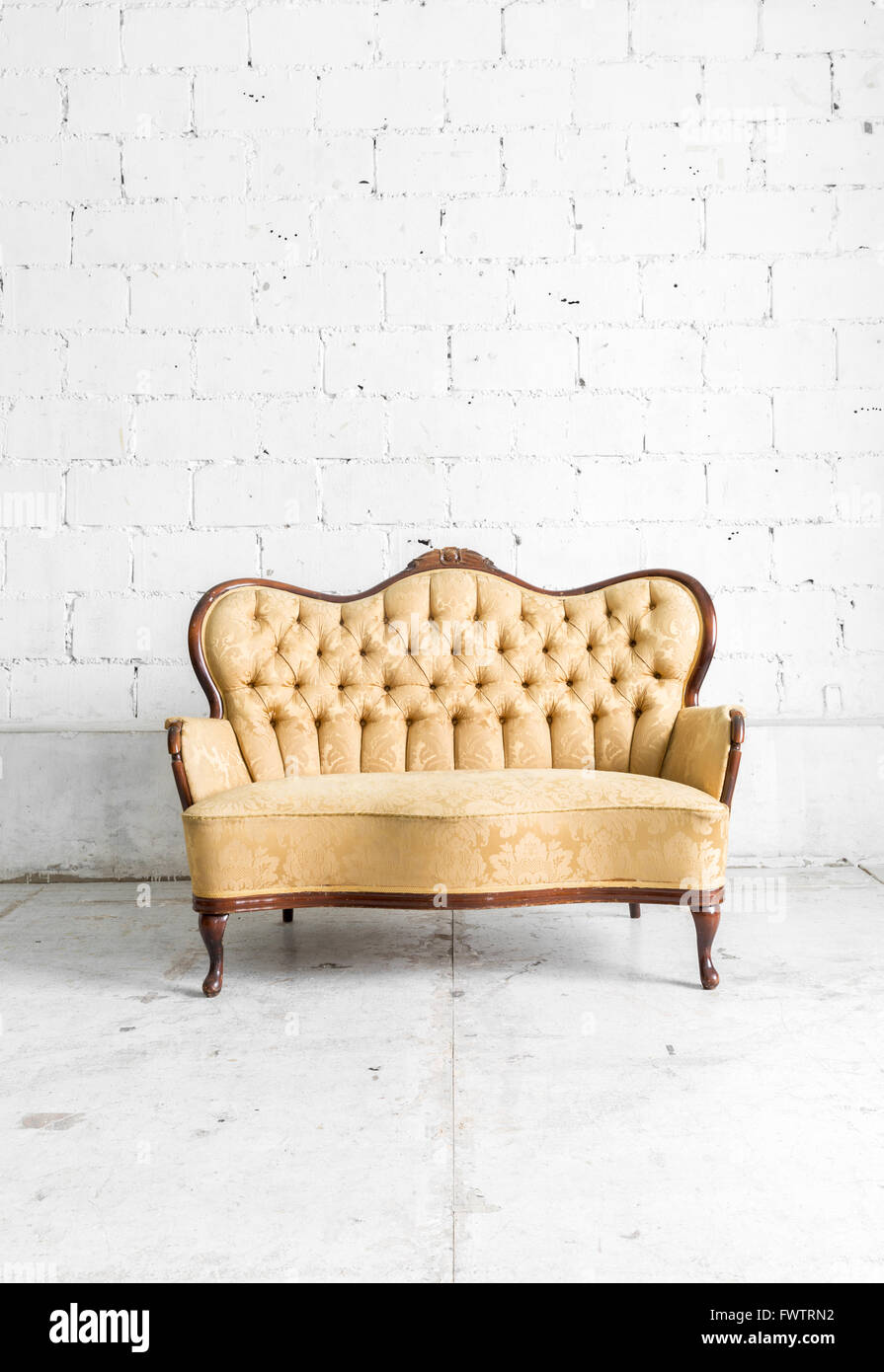 Brown Retro classical style sofa couch in vintage room Stock Photo - Alamy