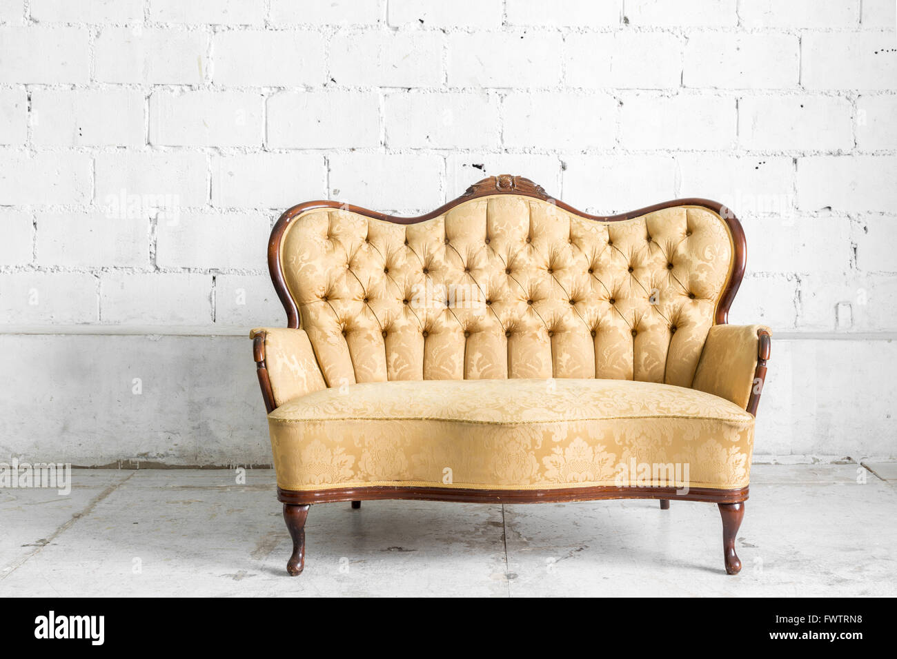 Brown Retro classical style sofa couch in vintage room Stock Photo - Alamy