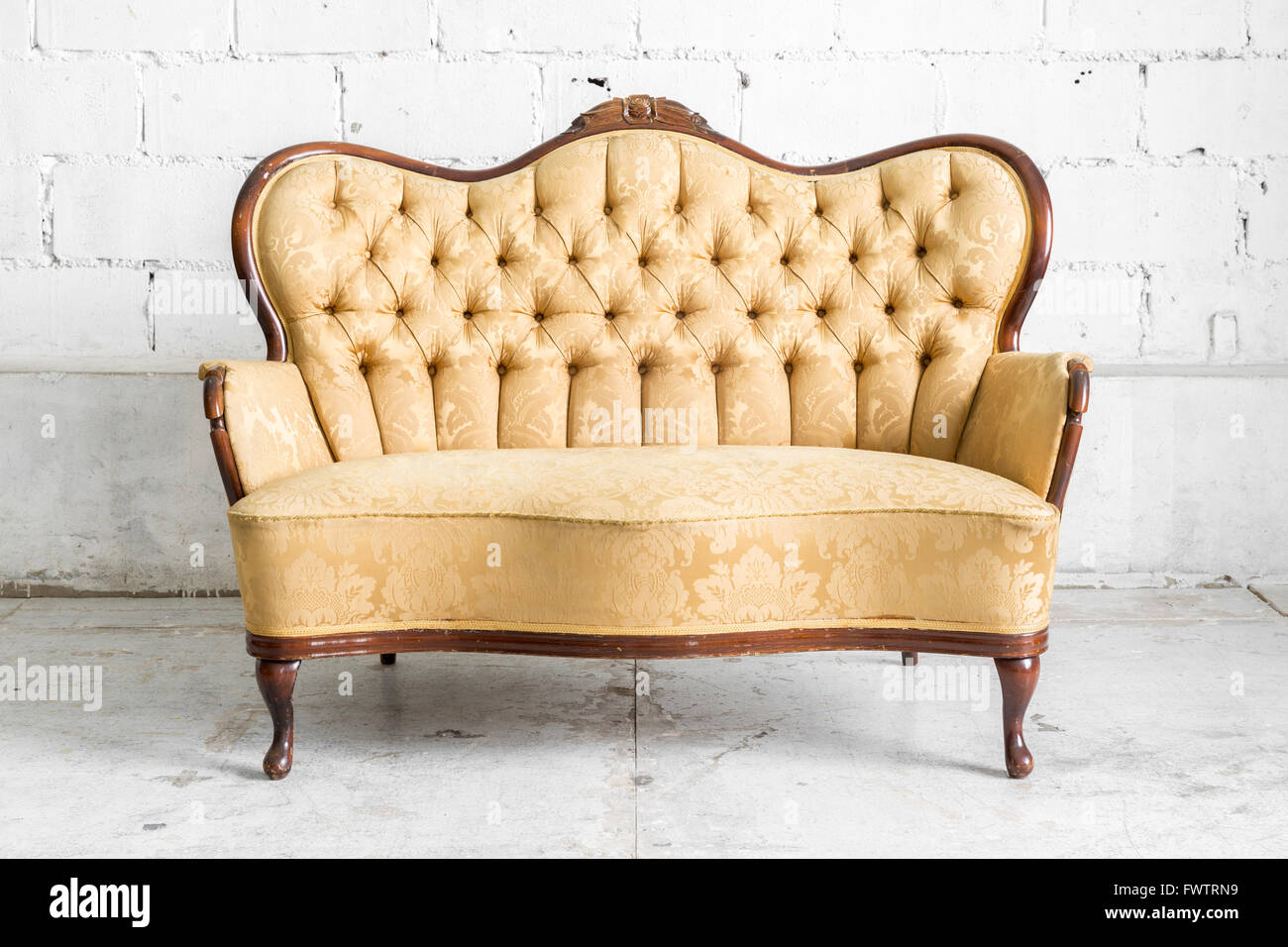 Brown Retro classical style sofa couch in vintage room Stock Photo - Alamy