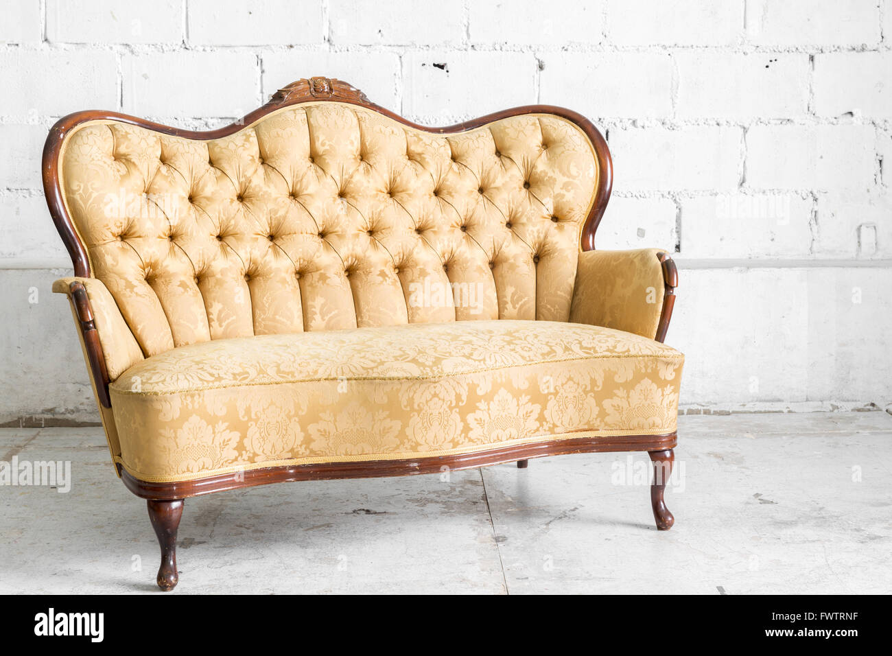 Brown Retro classical style sofa couch in vintage room Stock Photo - Alamy