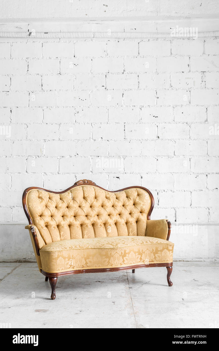Brown Retro classical style sofa couch in vintage room Stock Photo - Alamy
