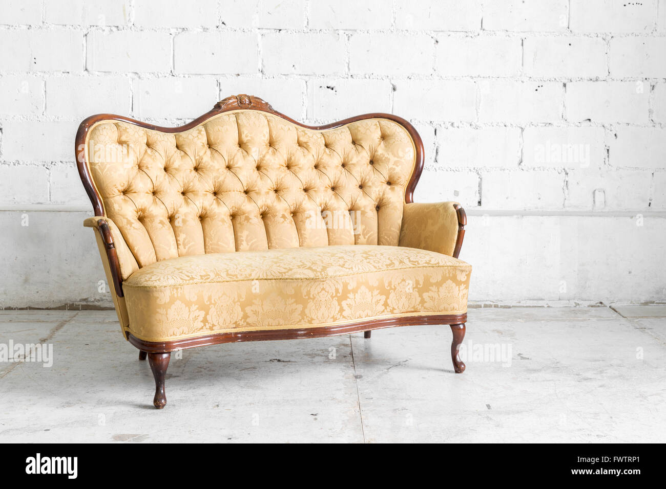 Brown Retro classical style sofa couch in vintage room Stock Photo - Alamy