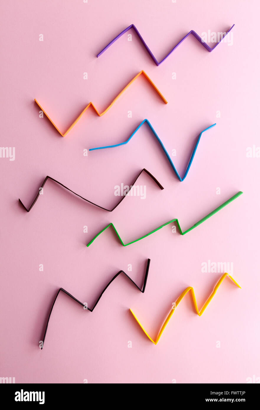 Creative colorful chart on a pink background Stock Photo - Alamy