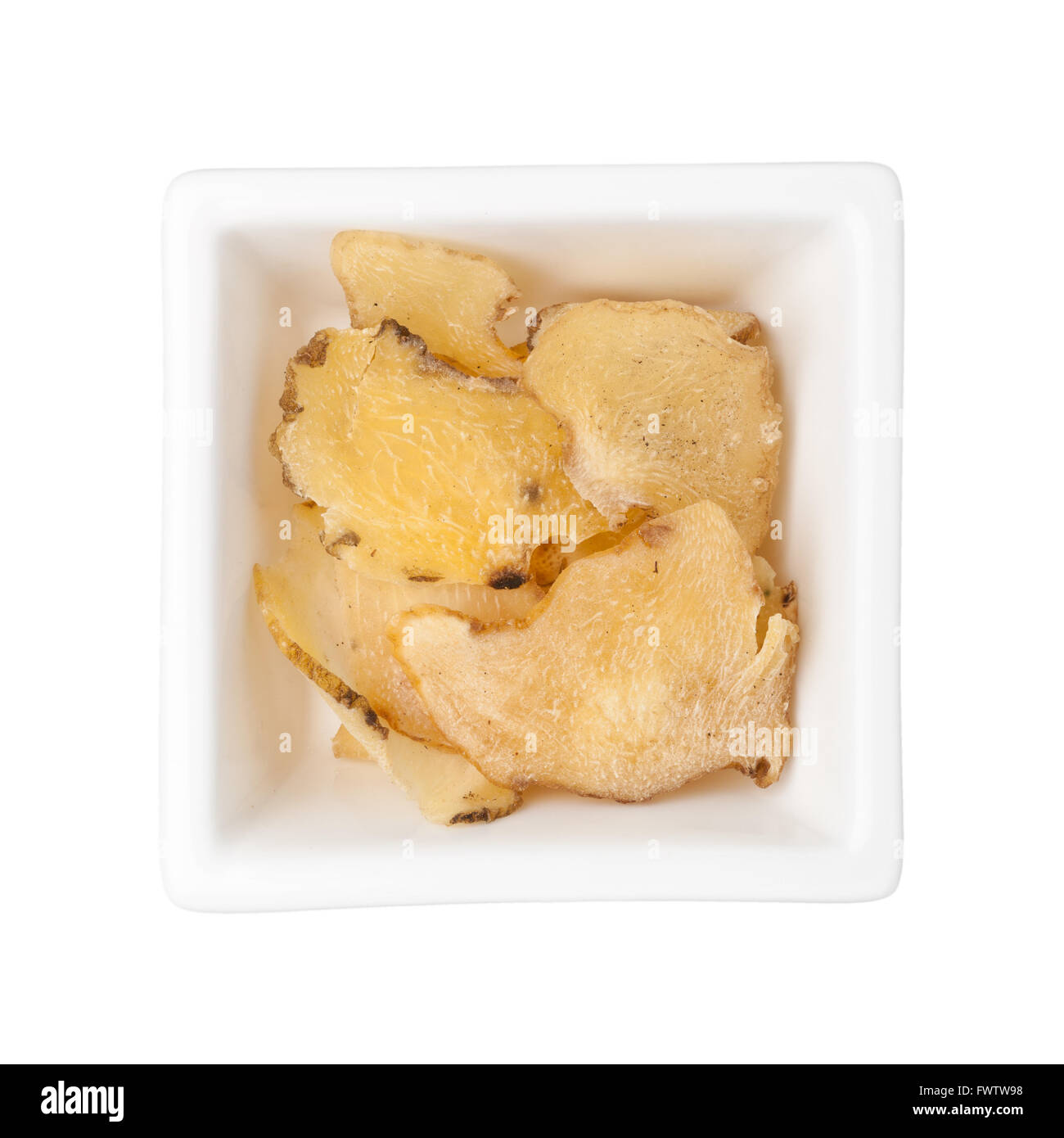 Traditional Chinese Medicine - Yuzhu in a square bowl isolated on white ...