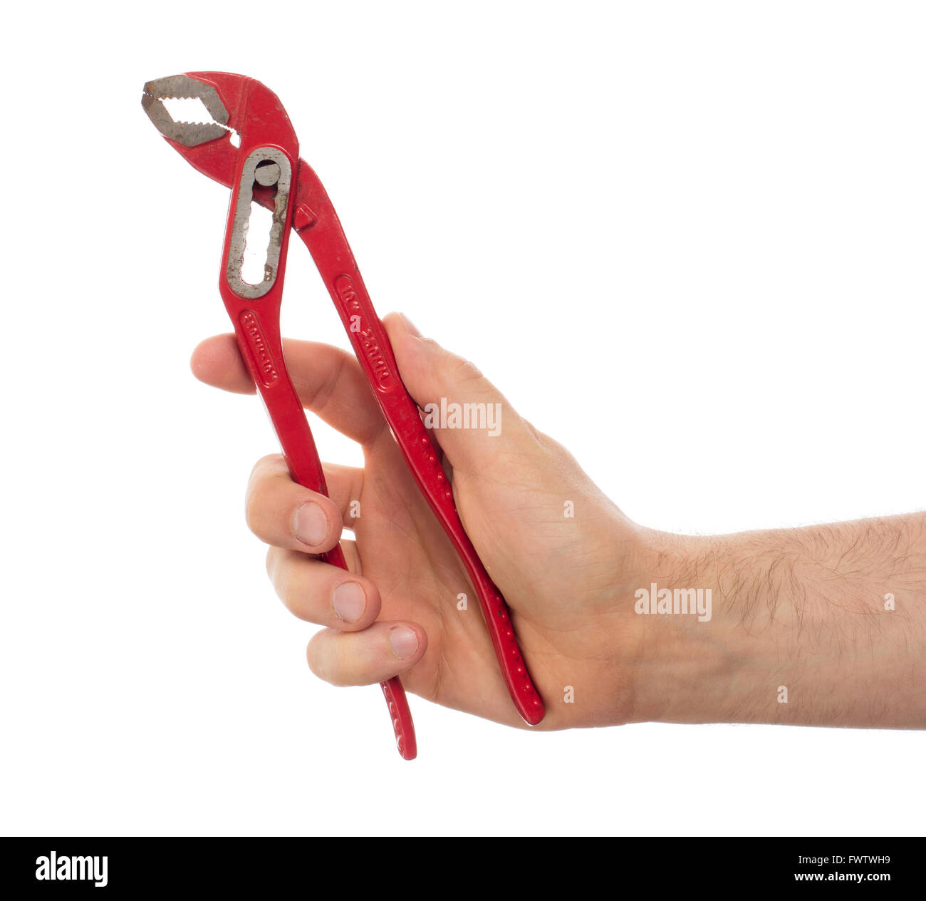 Hand of male plumber with a red wrench, isolated Stock Photo - Alamy