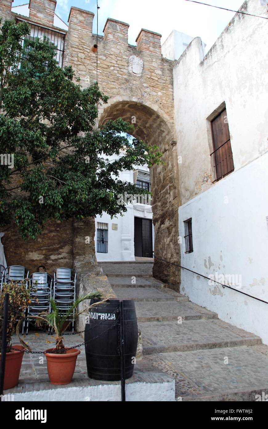 Steps leading to an arch in the castle wall, Vejer de la Frontera ...