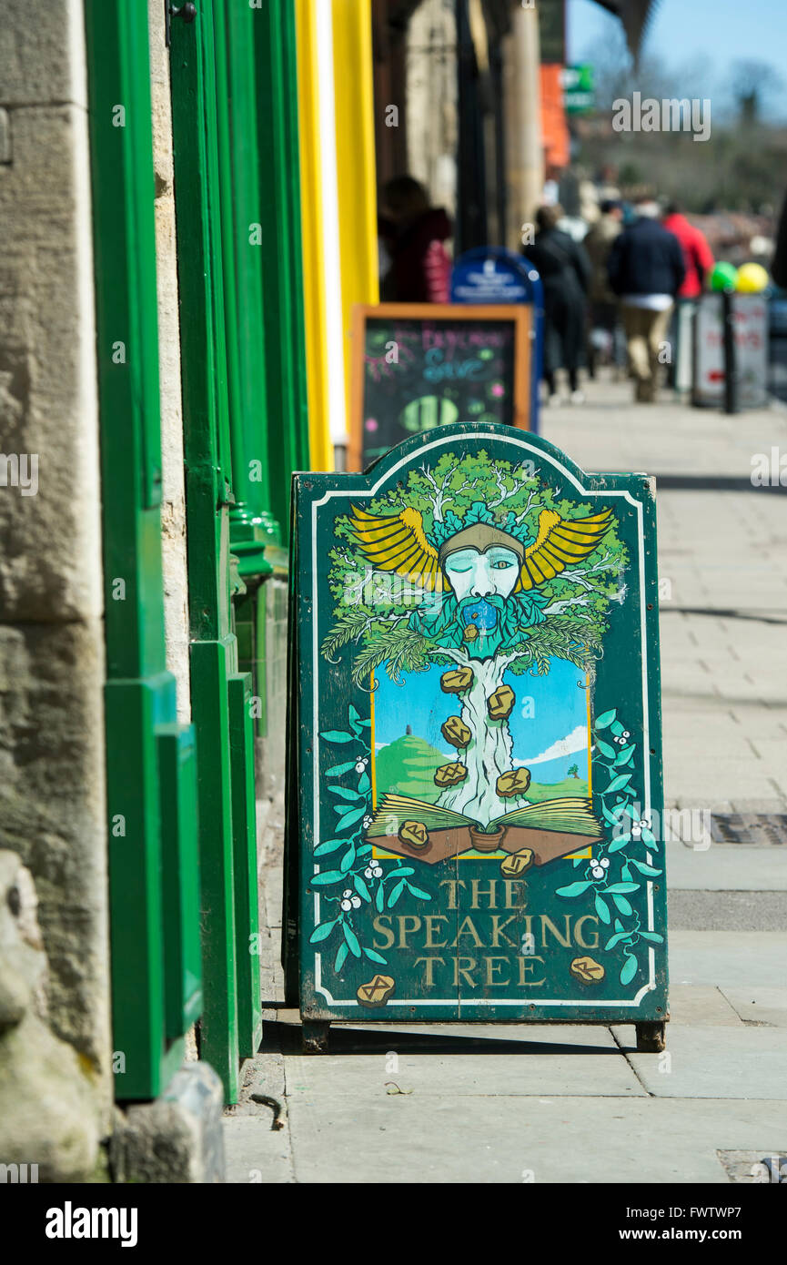 The speaking tree sign board on the high street. Glastonbury, Somerset ...