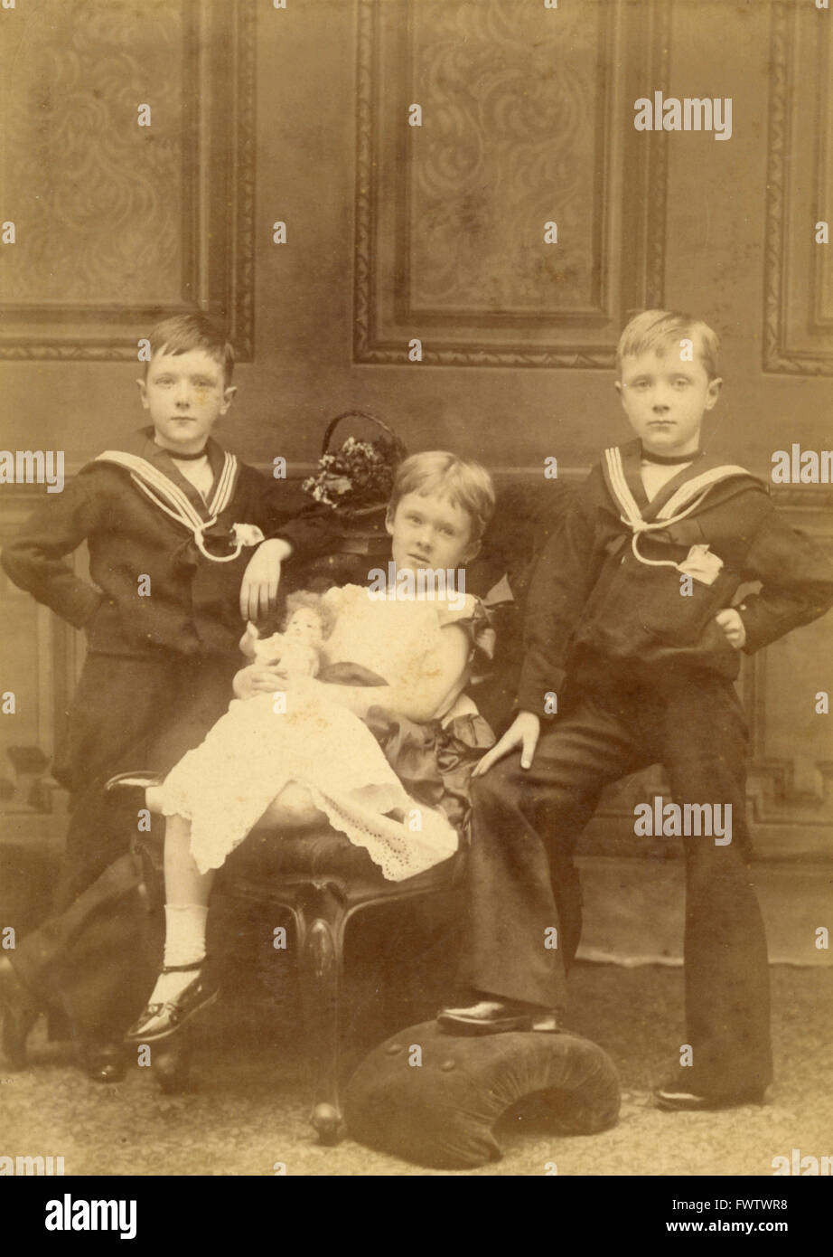 Portrait of three children, two dressed as sailors, UK Stock Photo - Alamy