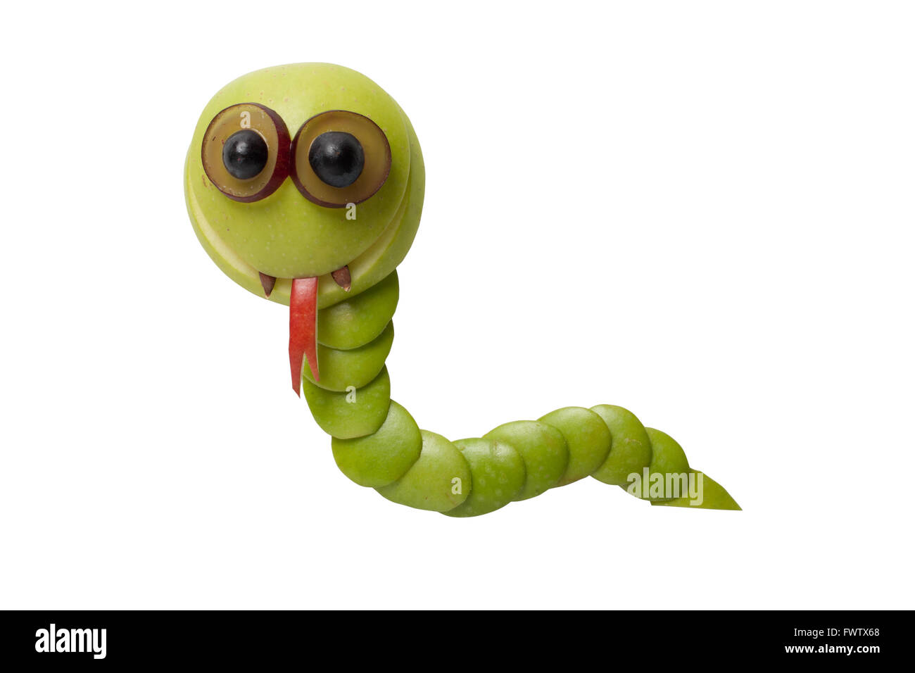 Viper made of green apple on isolated background Stock Photo - Alamy