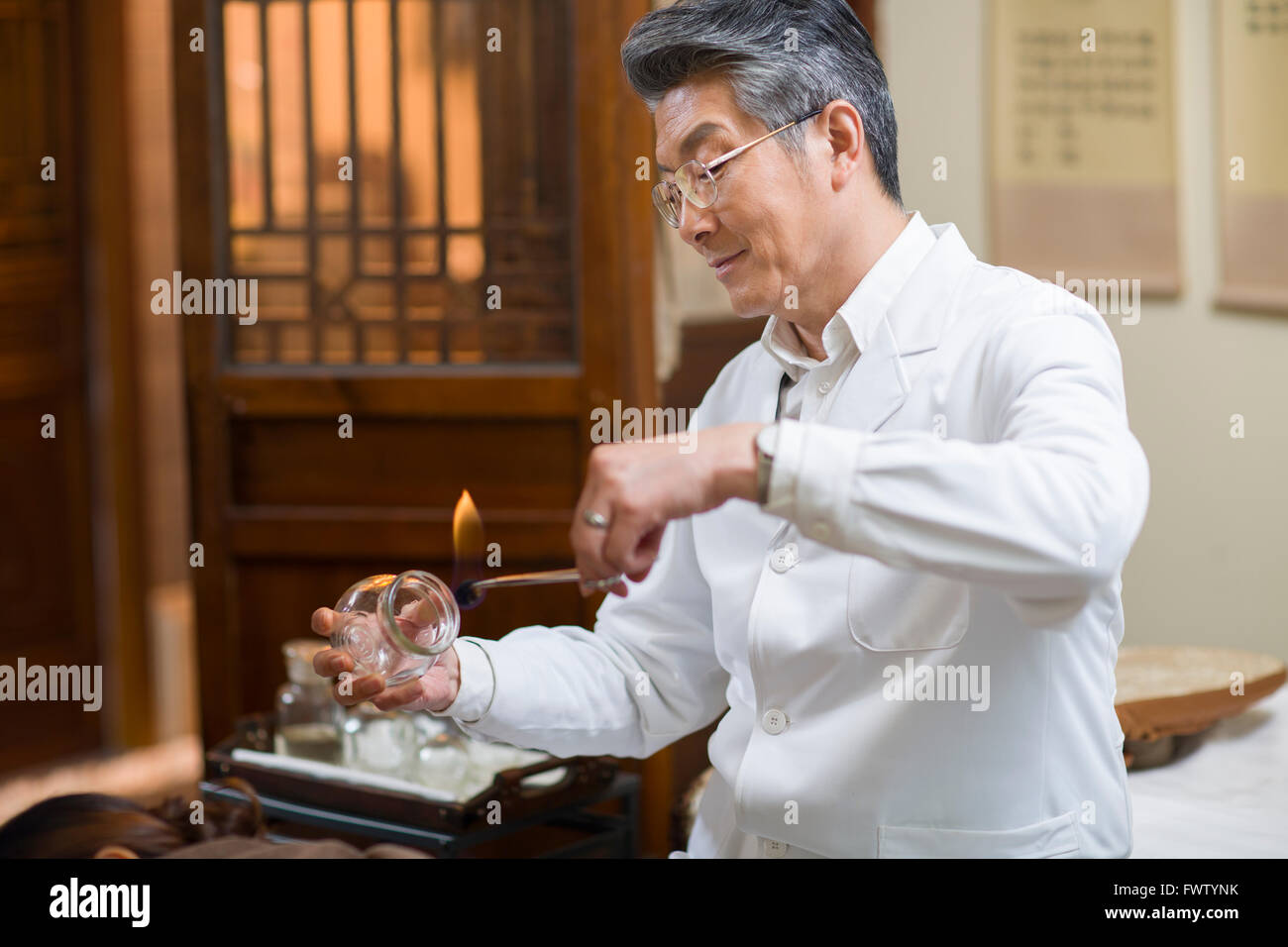 Chinese massage doctor hi-res stock photography and images - Alamy