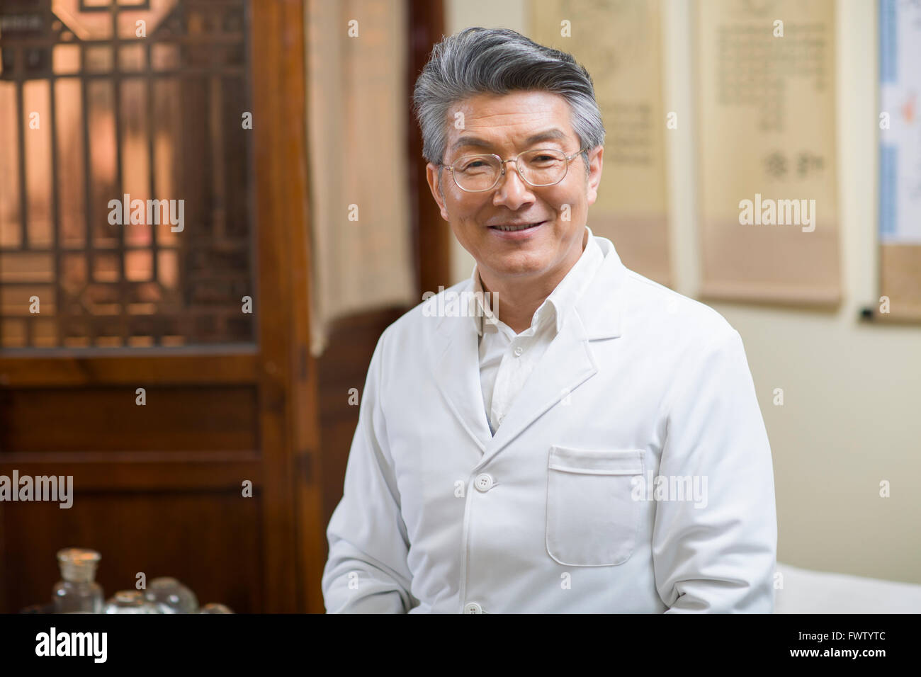 Portrait of senior Chinese doctor Stock Photo - Alamy