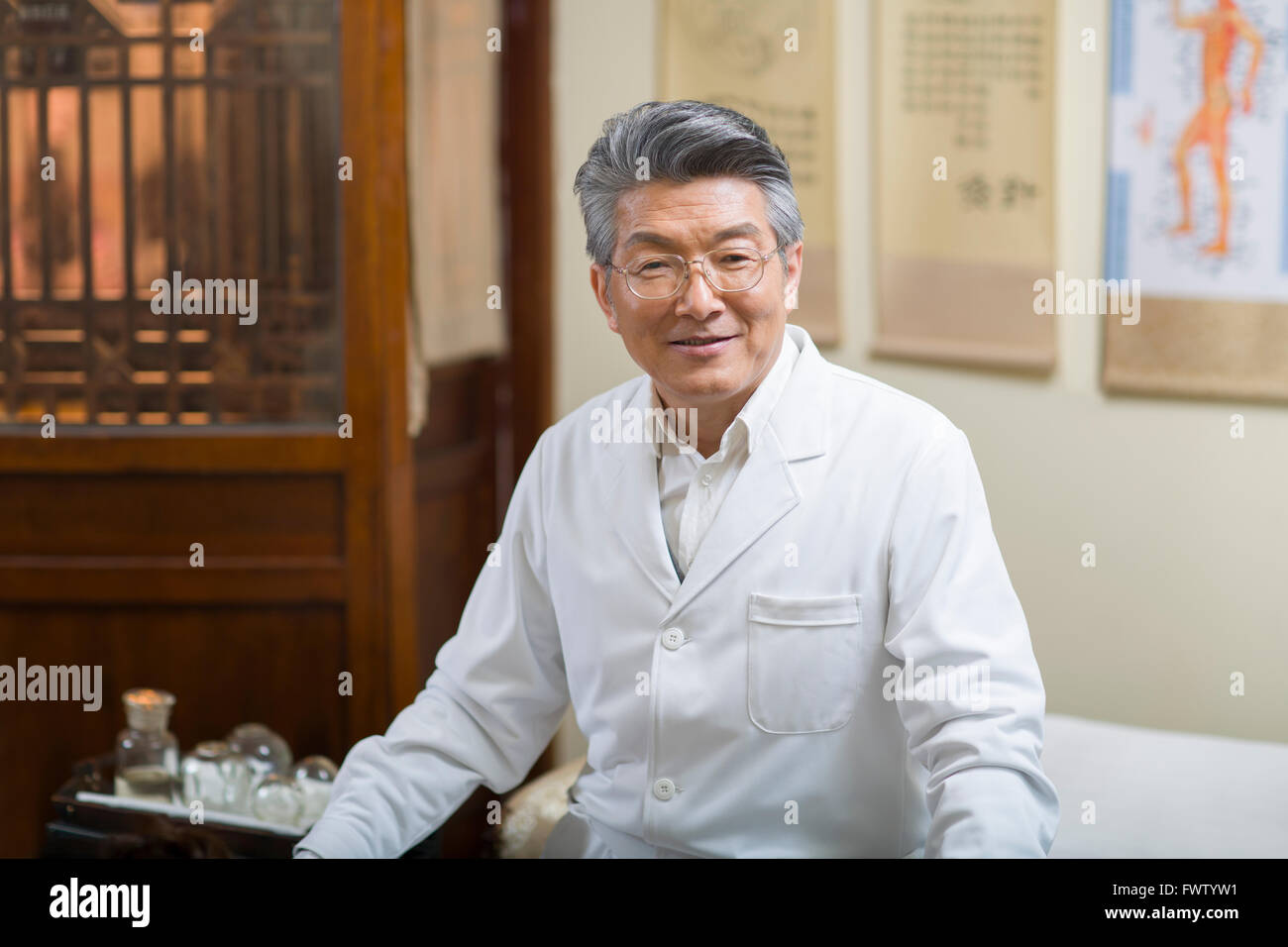 Portrait of senior Chinese doctor Stock Photo - Alamy