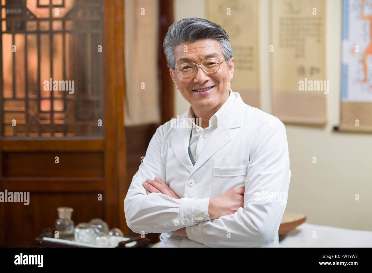Portrait of senior Chinese doctor Stock Photo - Alamy