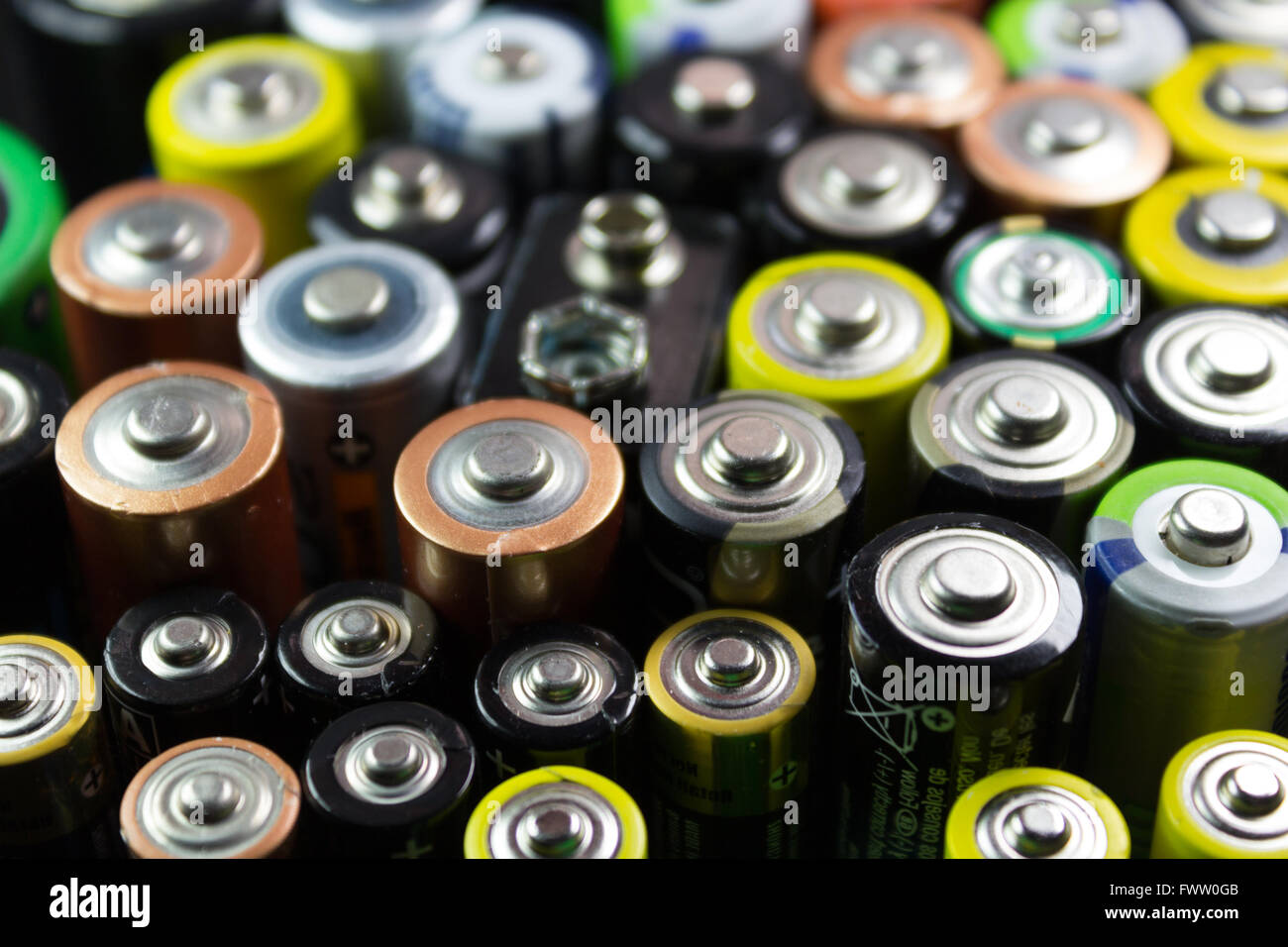 Batteries of different types and colors Stock Photo - Alamy