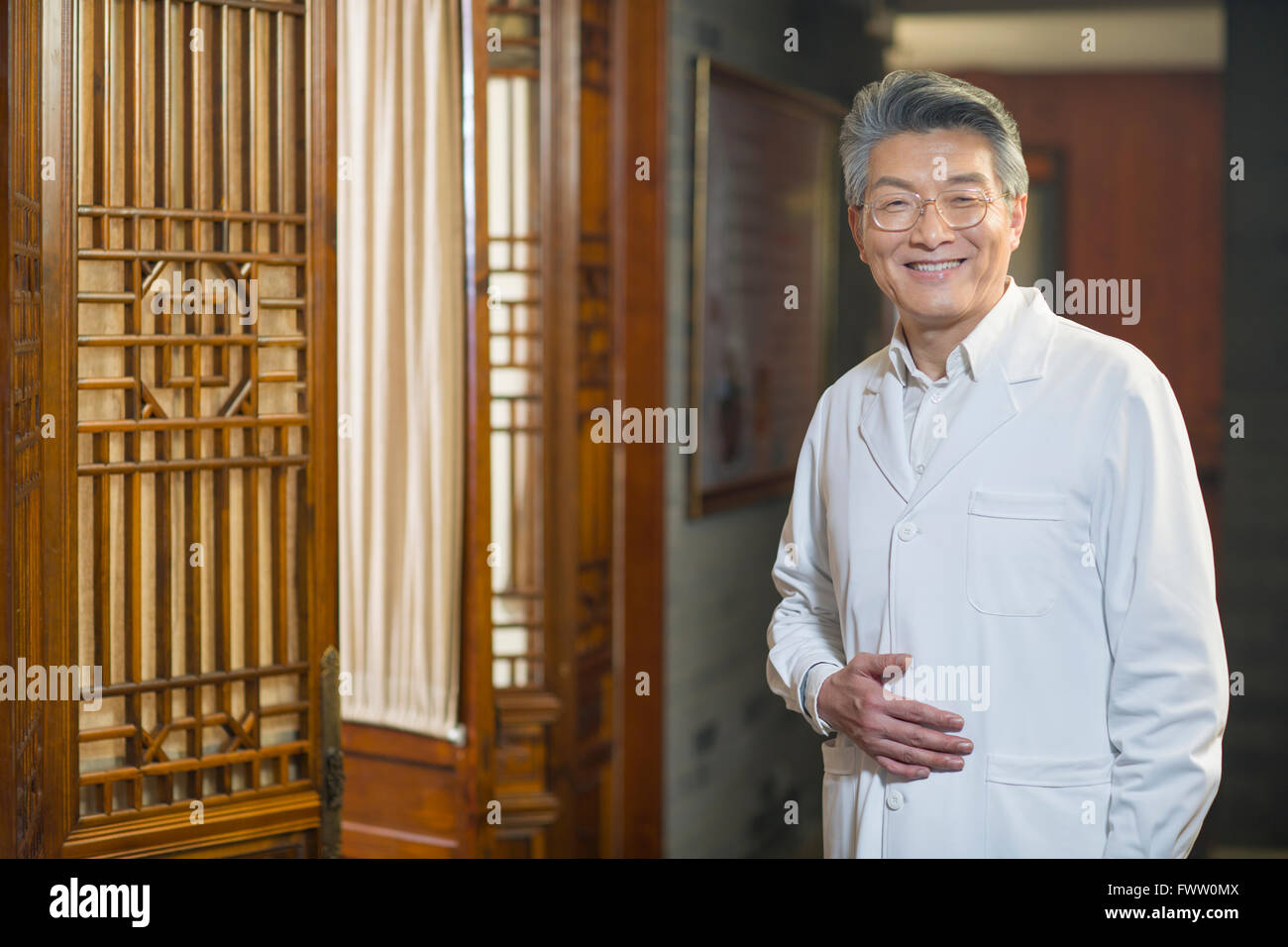 Portrait of senior Chinese doctor Stock Photo - Alamy