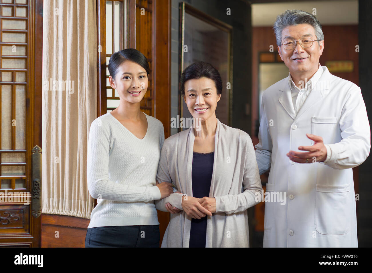 Senior Chinese doctor and patient Stock Photo - Alamy