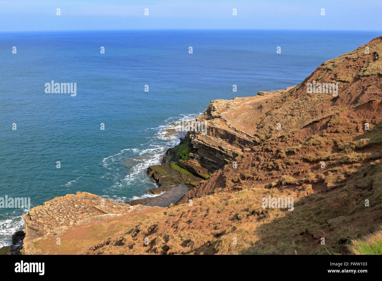 Erosion on Filey Brigg natural rock promontory, Filey, North Yorkshire ...