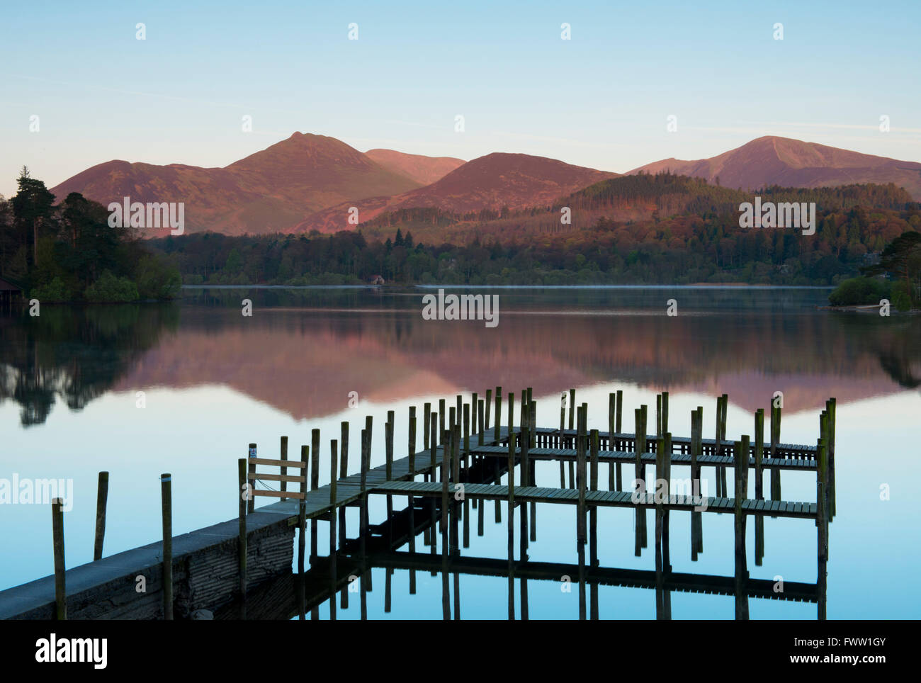 An early morning view of a jetty at Keswick Landing on Derwent Water in ...