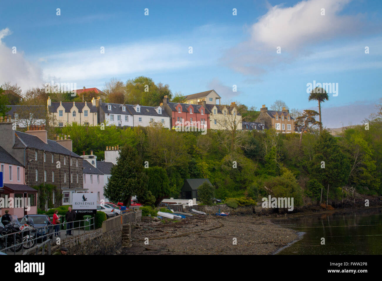 A view of the colourful houses in the seaside town of Portree on the ...
