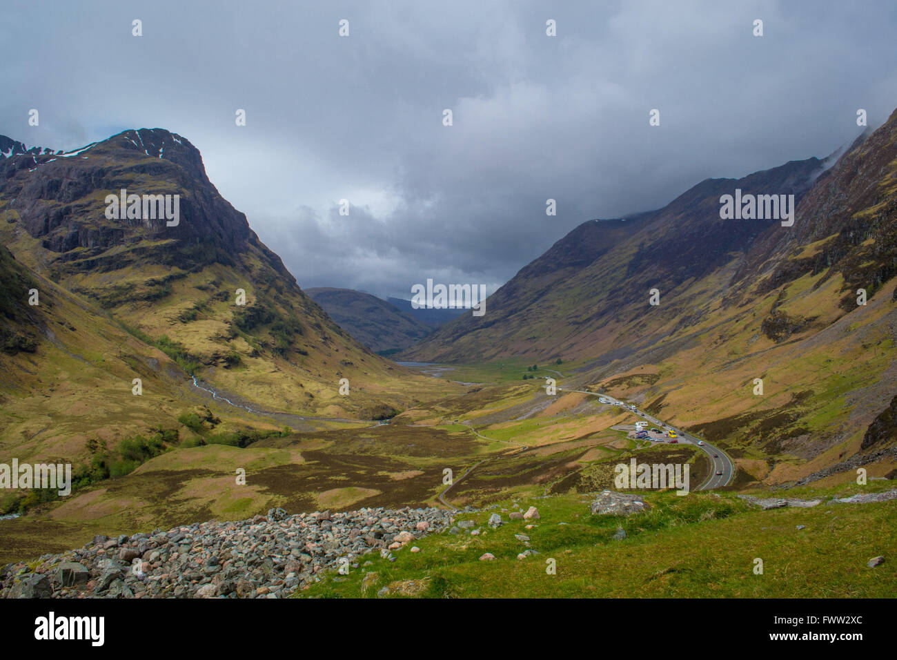 A road going through a valley in Glencoe in the Scottish highlands ...