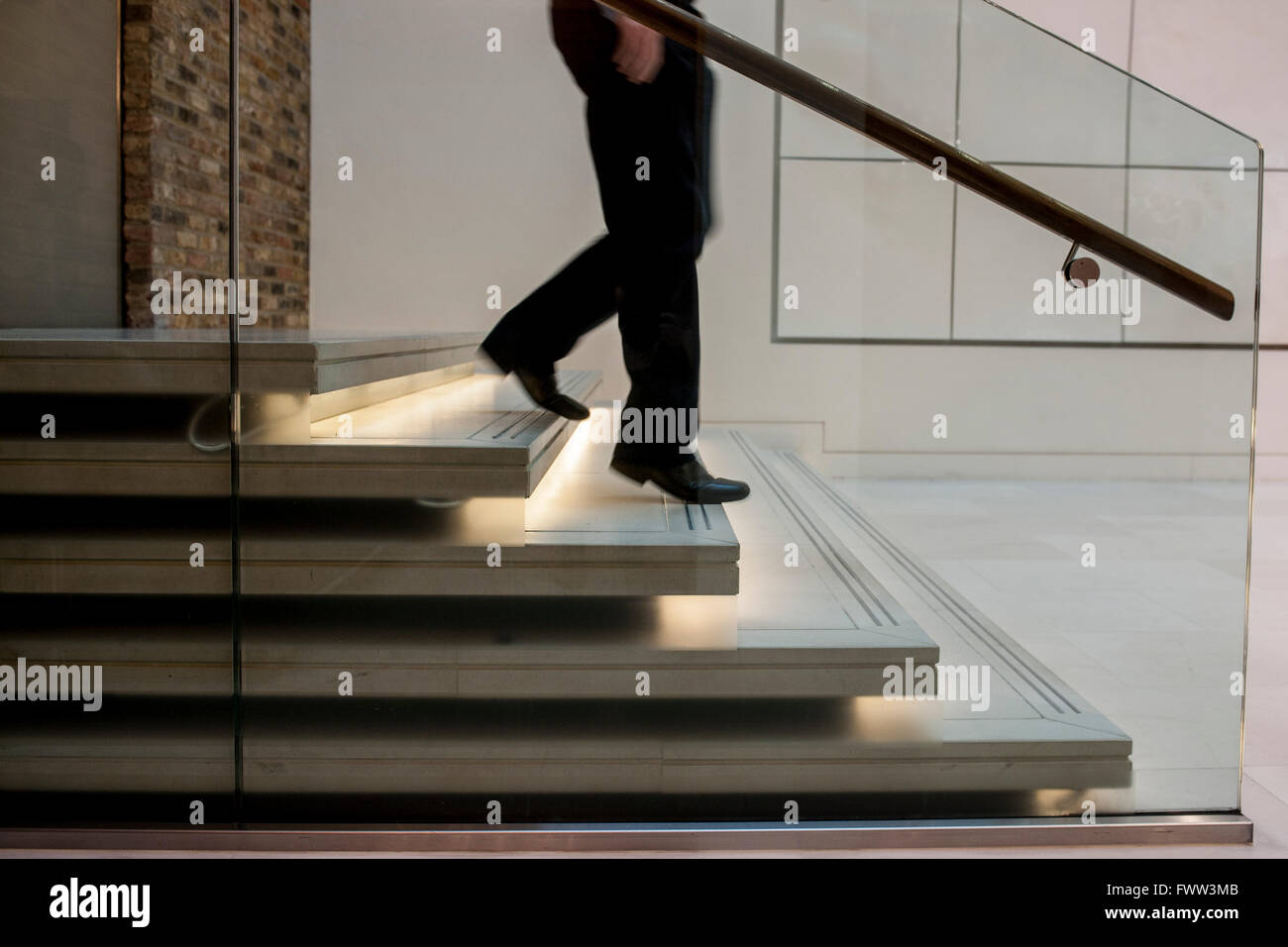 Man walking up stairs open hi-res stock photography and images - Alamy