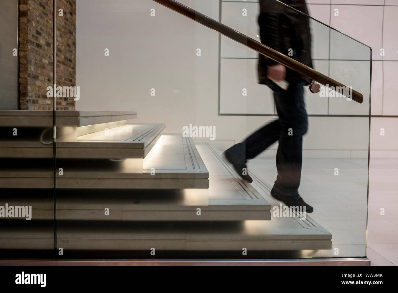 Man walking up stairs open hi-res stock photography and images - Alamy