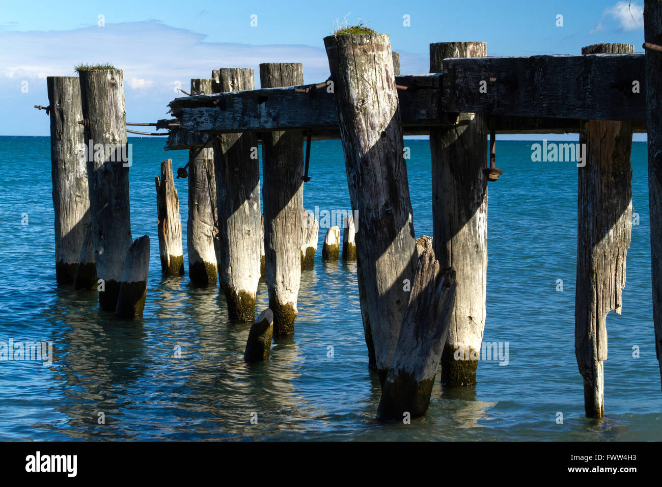 old rotting wooden pier support Stock Photo - Alamy
