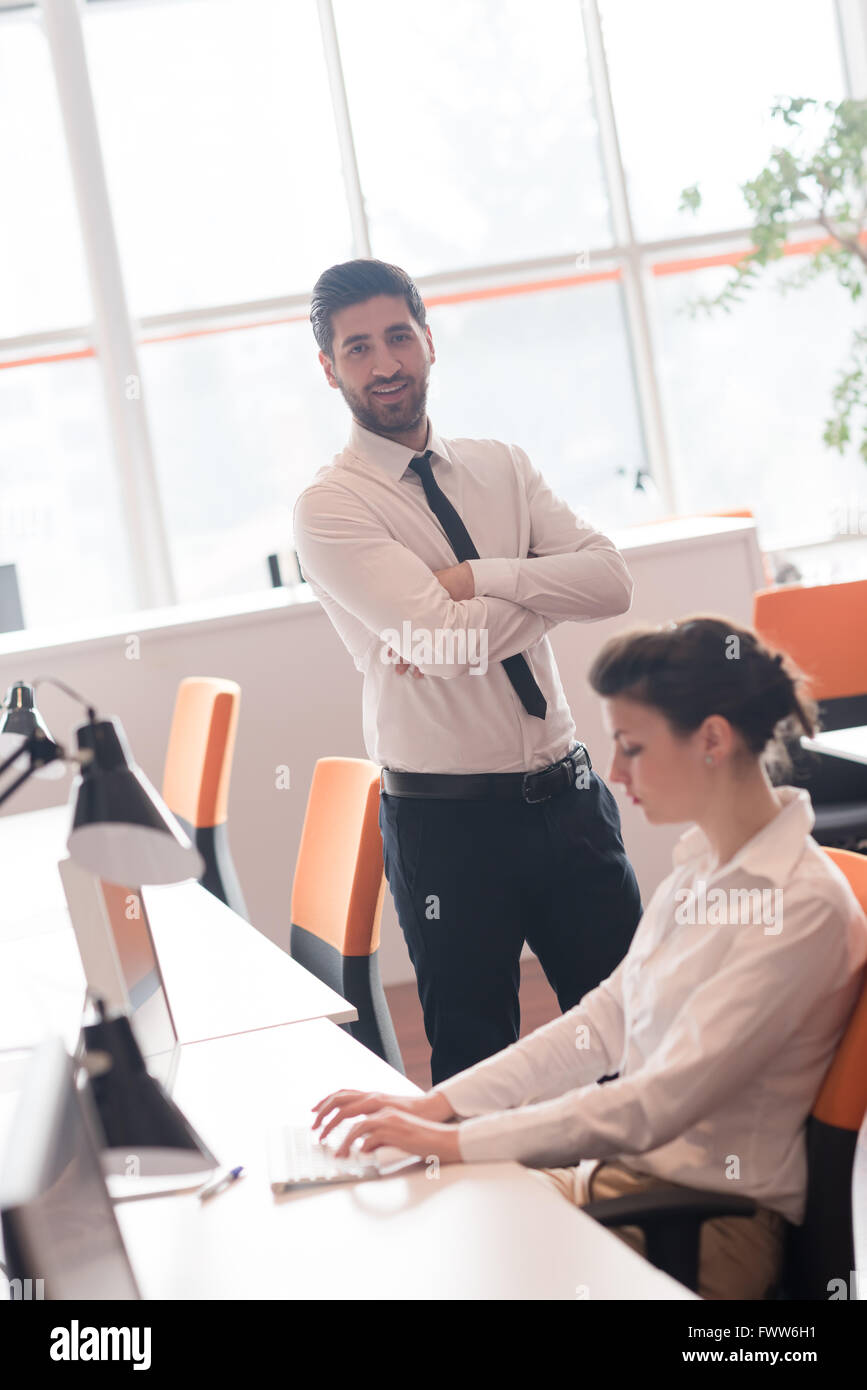 business woman working on desktop computer at modern startup office ...