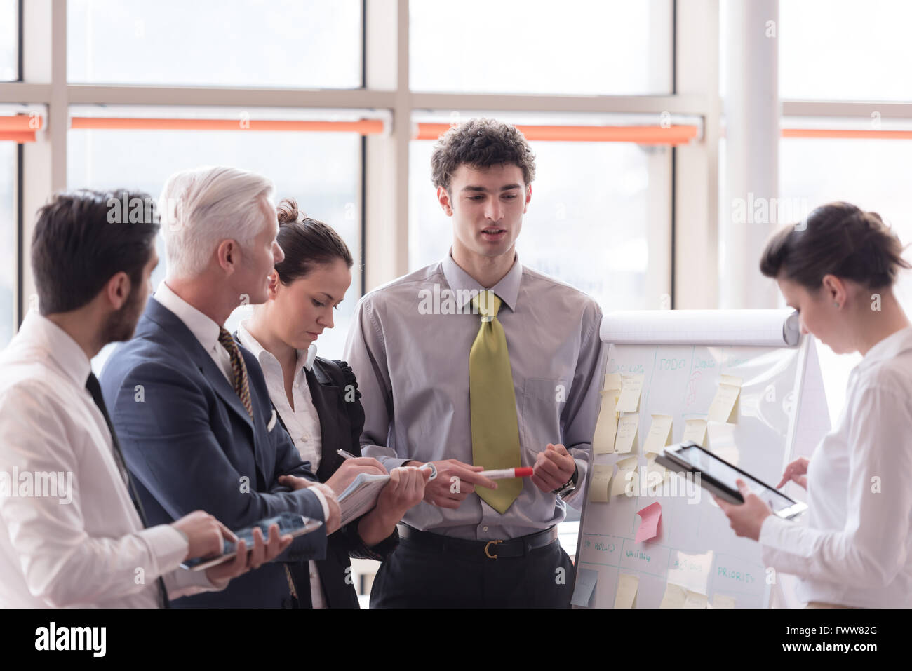 young startup businessman making presentation of project to senior ...