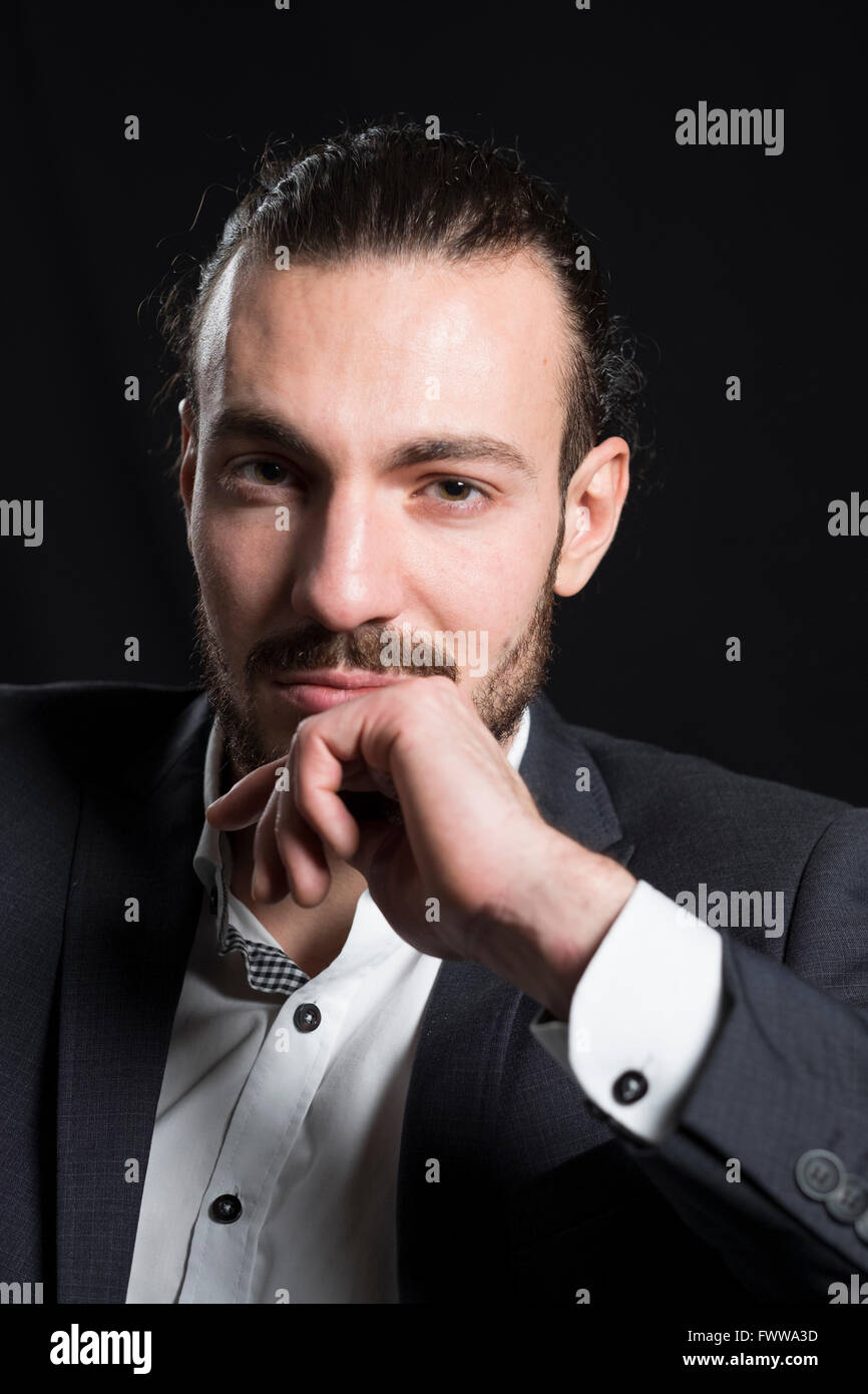 Black man hand on chin hi-res stock photography and images - Alamy