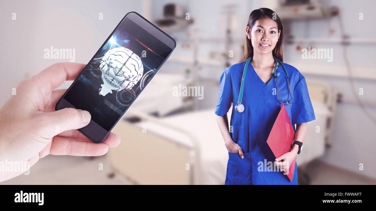 Composite image of asian nurse with stethoscope looking at the camera ...