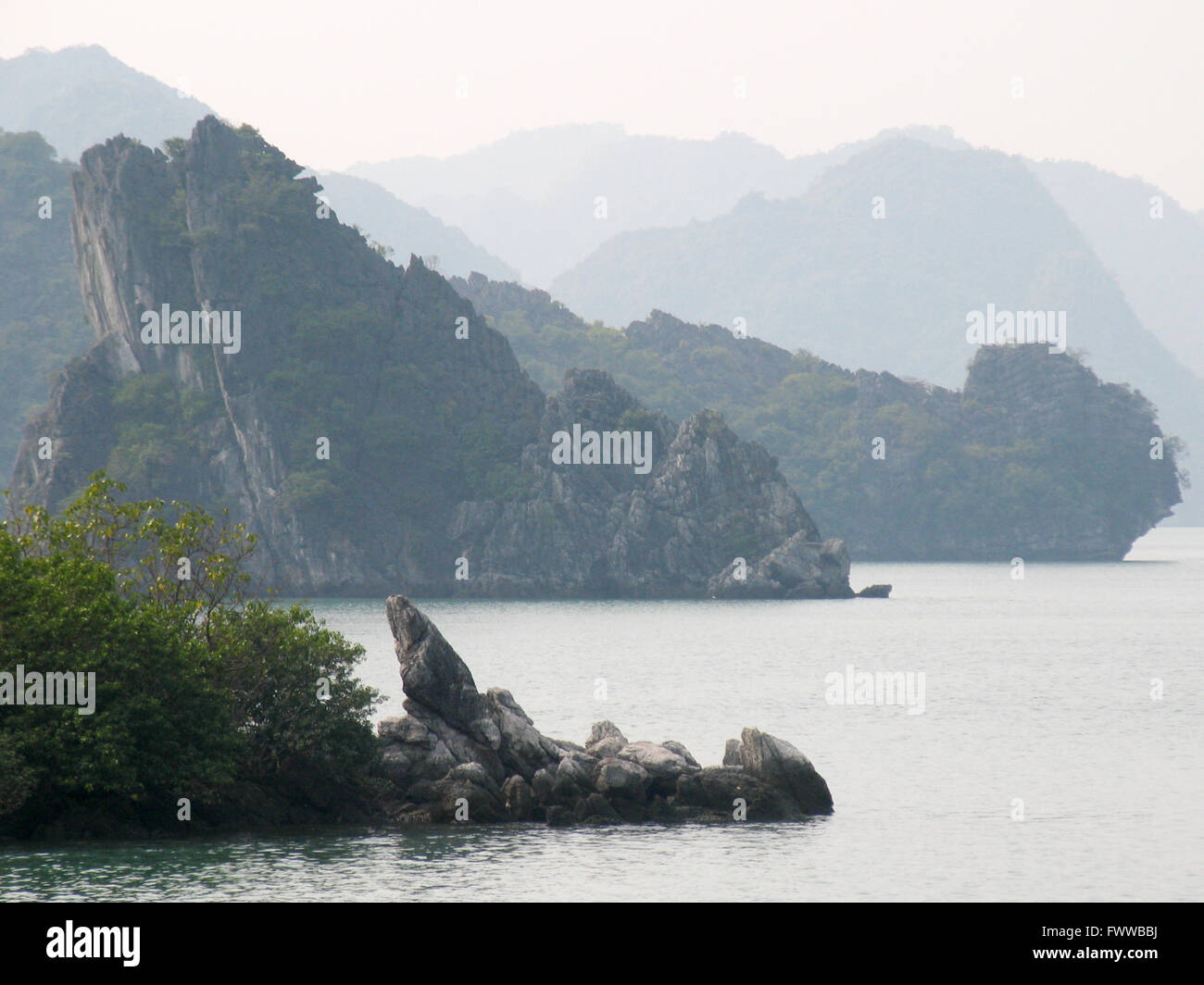 Limestone karst islands in Halong Bay, Vietnam Stock Photo - Alamy