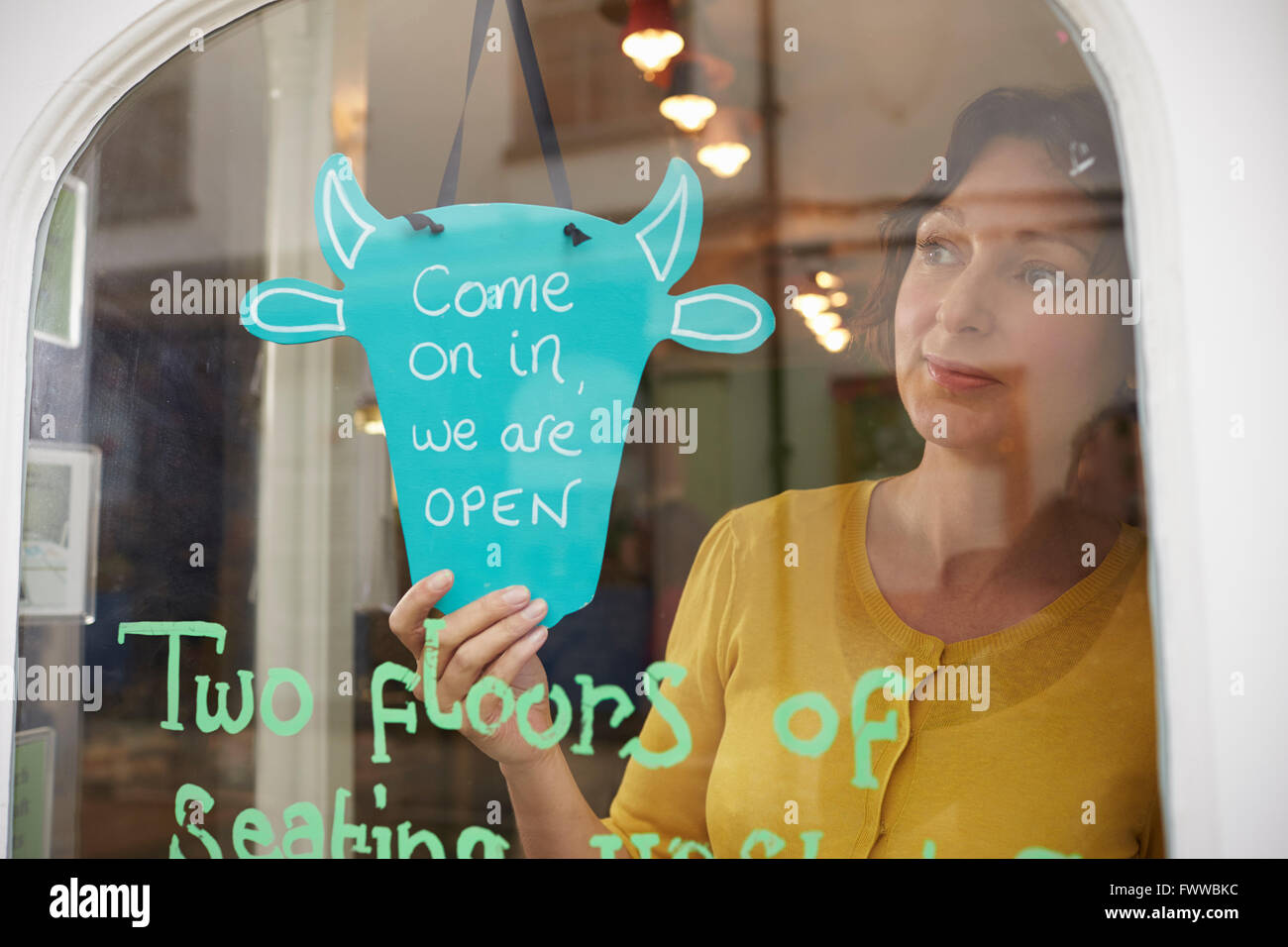 Turning the open sign hi-res stock photography and images - Alamy