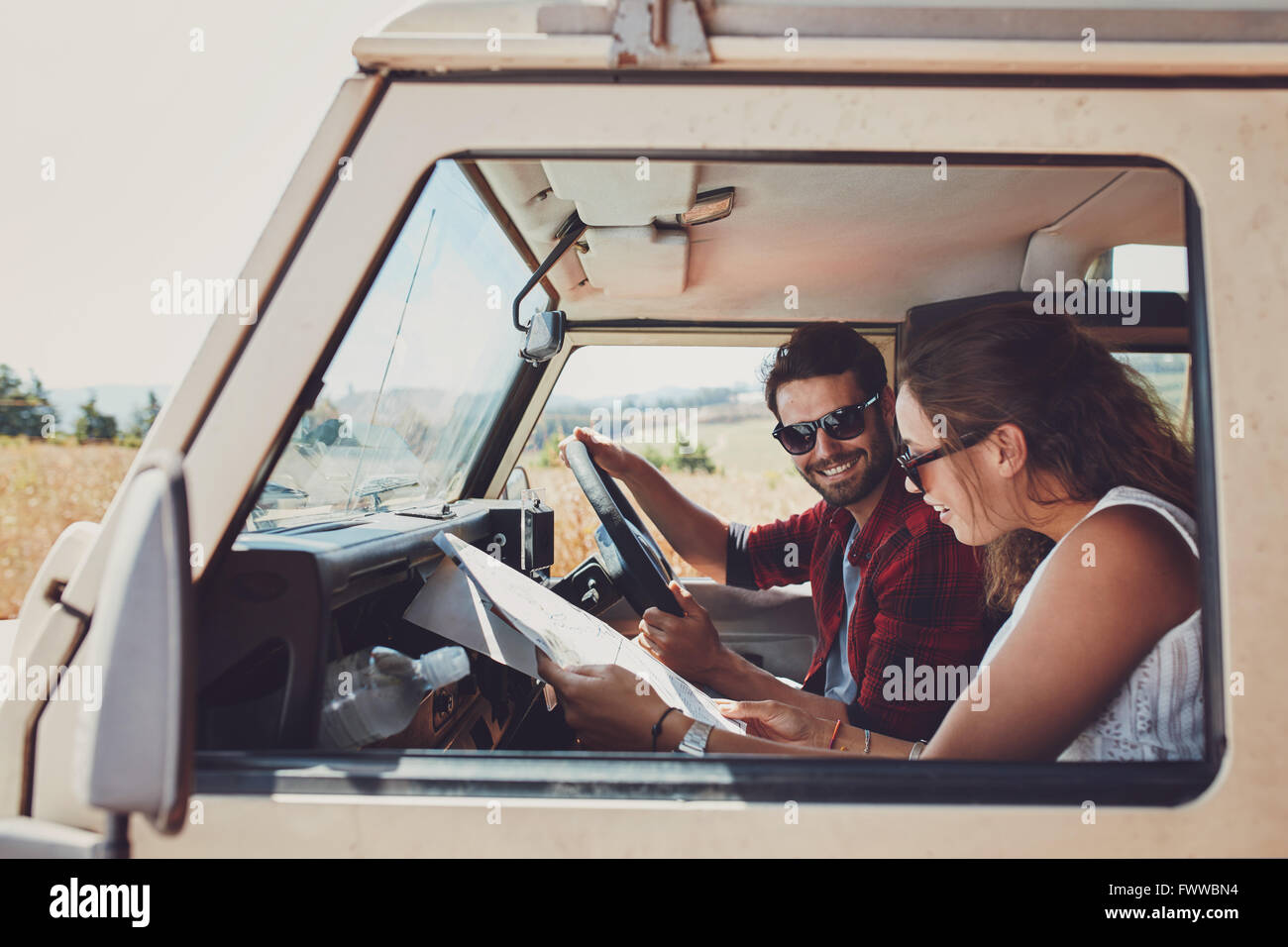 Reading map inside car hi-res stock photography and images - Alamy