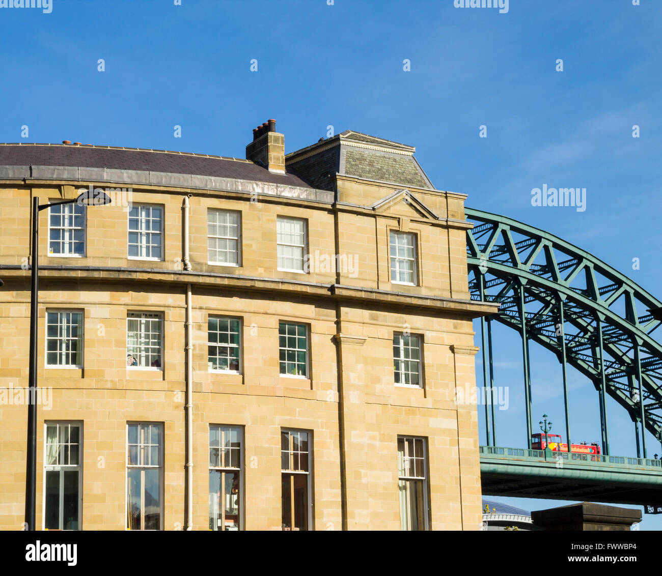View from The Quayside of open top sightseeing bus on Tyne Bridge ...